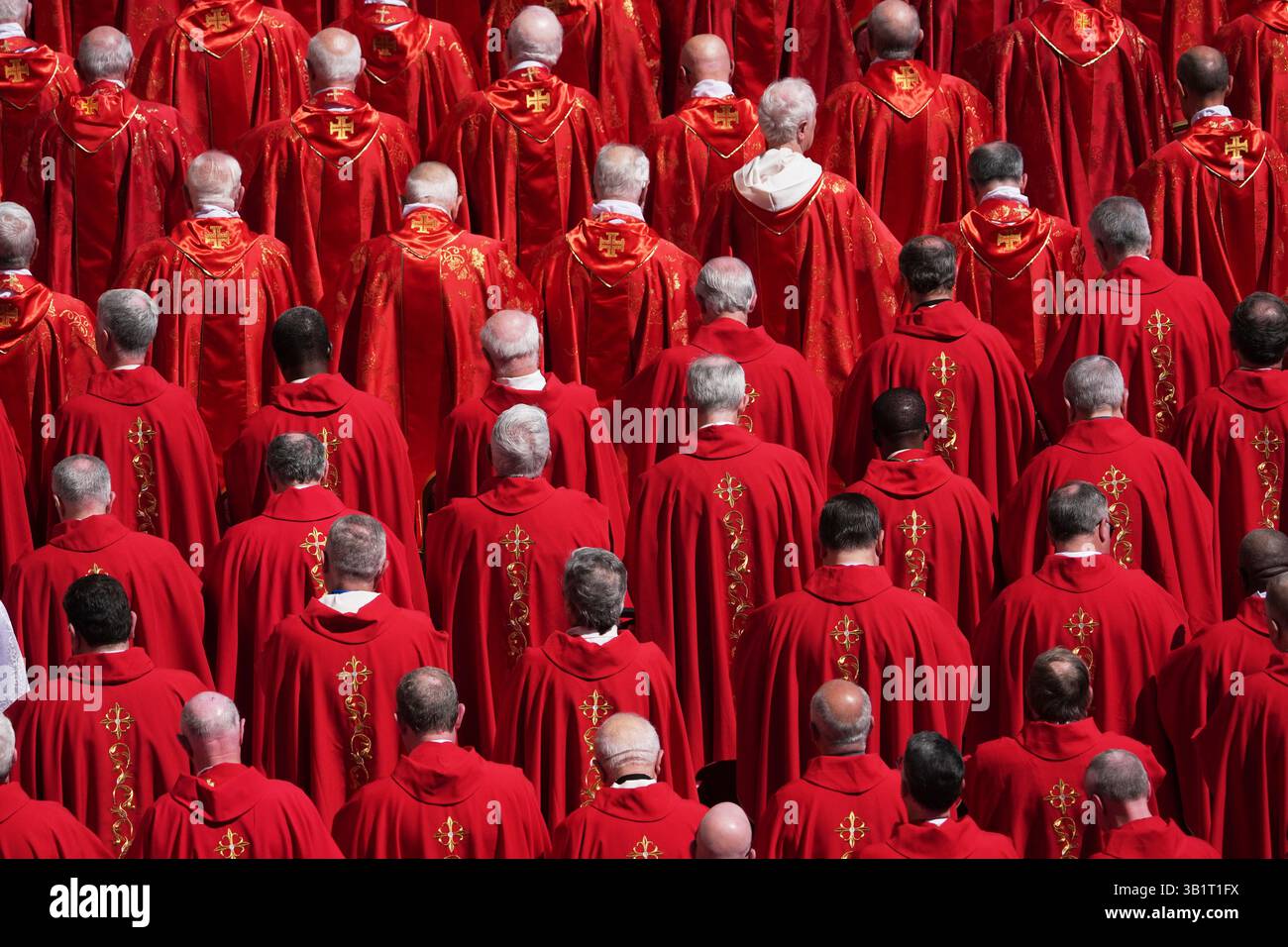 Clergy attend the funeral of Pope Francis in St. Peter's Square at the ...