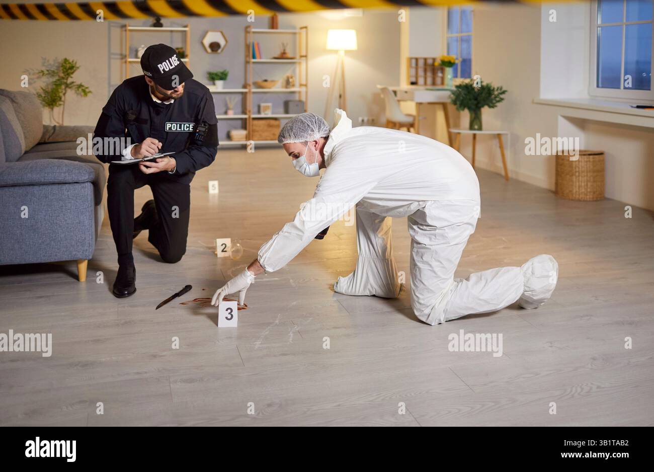 Policeman And Forensic Technician Examining Knife As Weapon At Crime ...