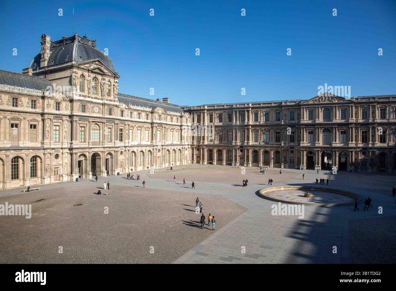Cour Carrée, the courtyard of Louvre Palace, seen through dirty museum ...