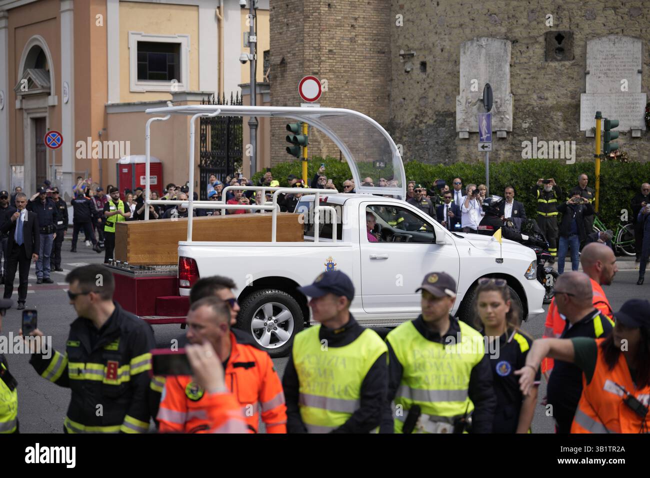 Rome, Italy. 26th Apr, 2025. The casket of Pope Francis is seen being ...