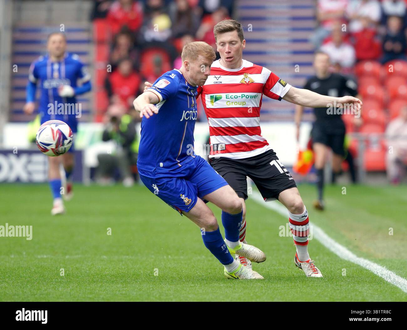 Doncaster Rovers' Harry Clifton against Bradford City's Brad Halliday ...