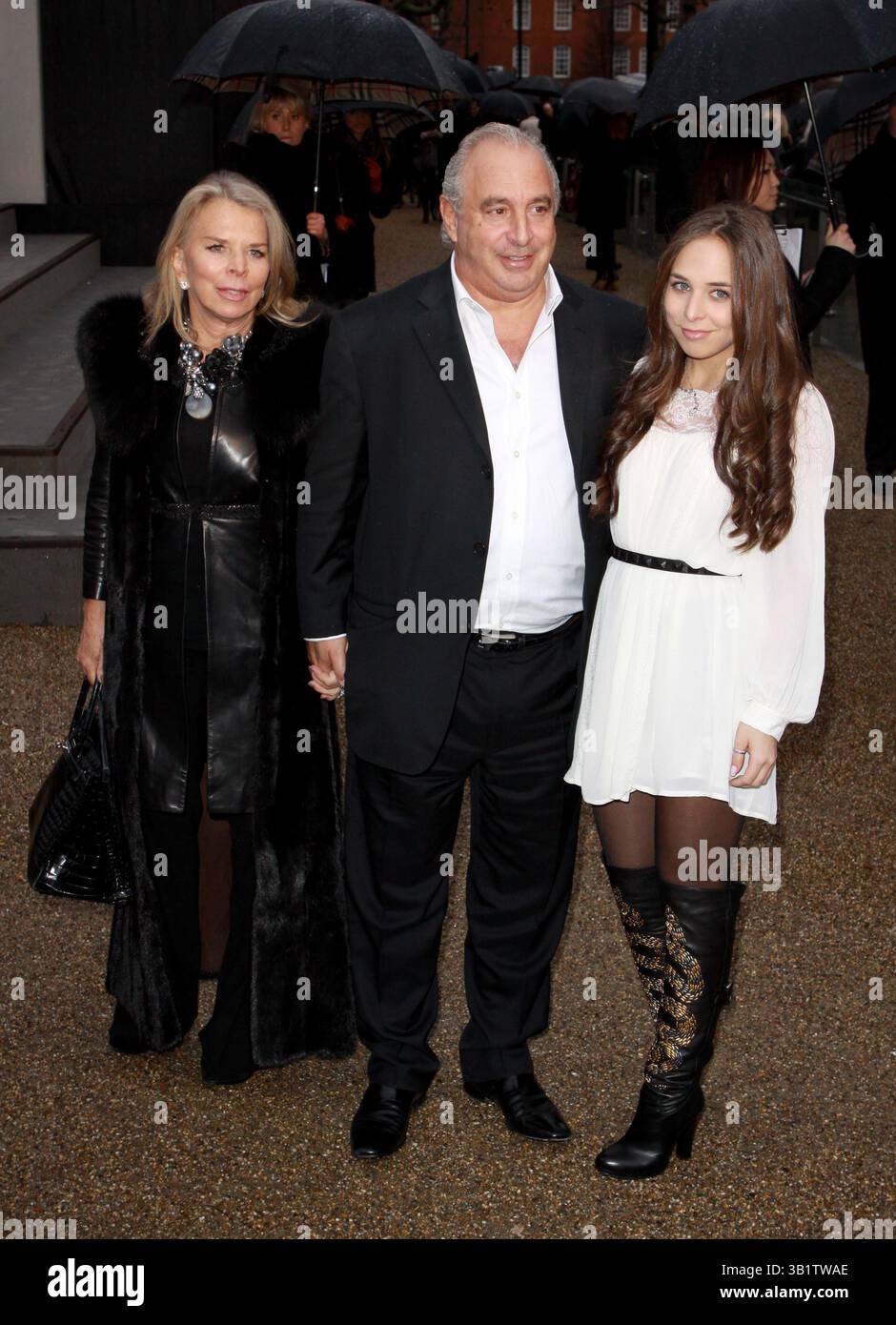 Philip Green with wife Tina and daughter Chloe arrive at the Burberry ...