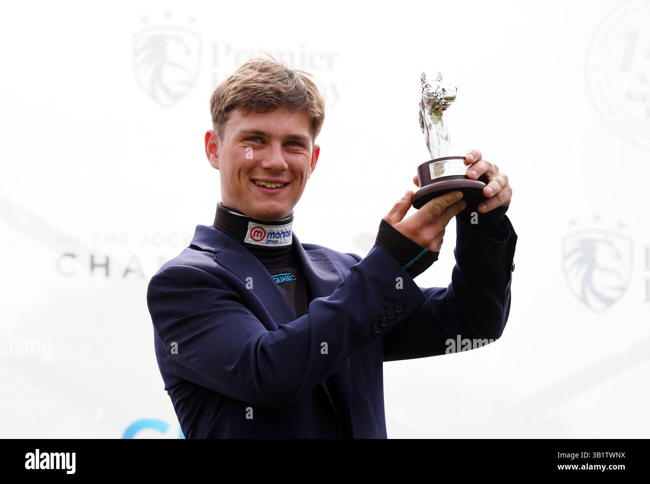 Freddie Gingell with the Champion Conditional Jockey trophy at Sandown ...