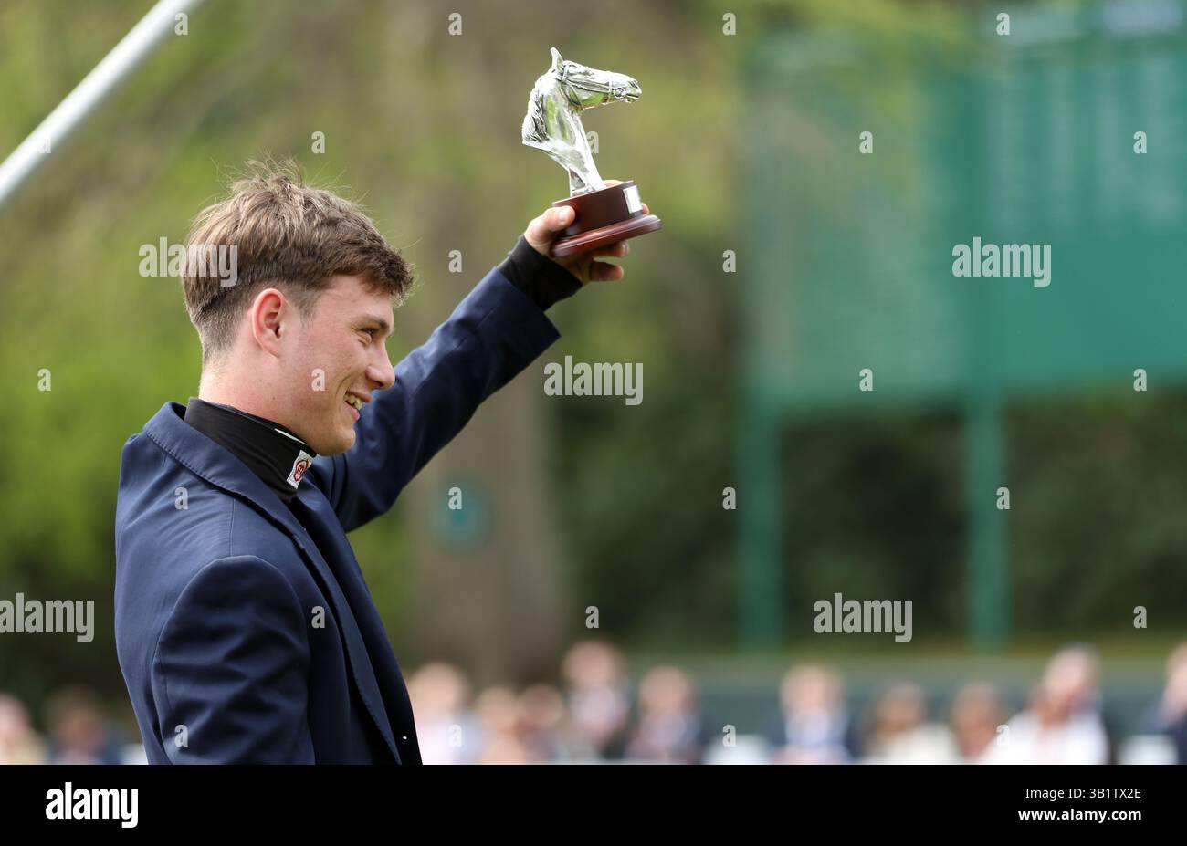 Freddie Gingell with the Champion Conditional Jockey trophy at Sandown ...