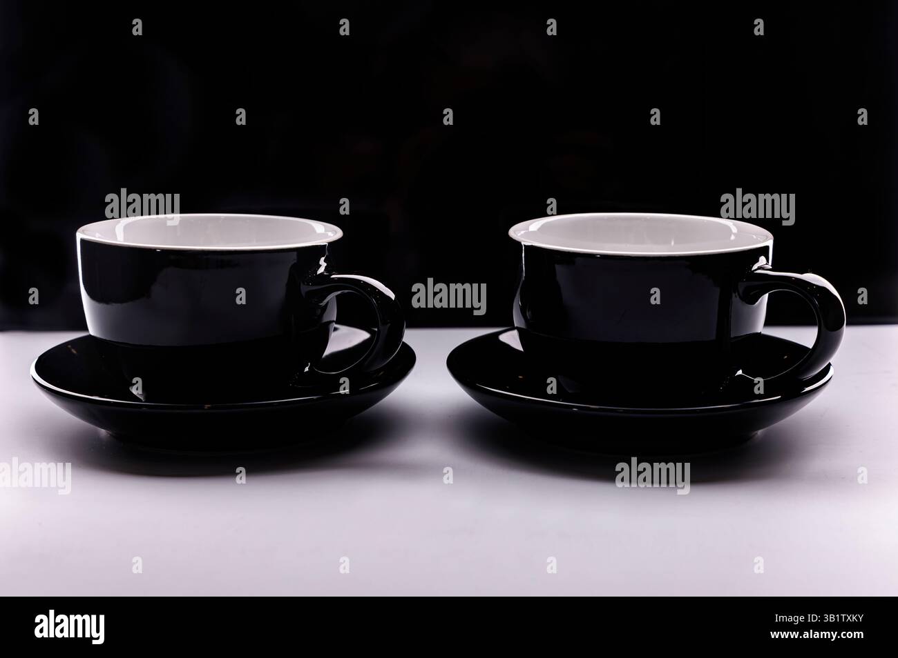 Black coffee pair hi-res stock photography and images - Alamy