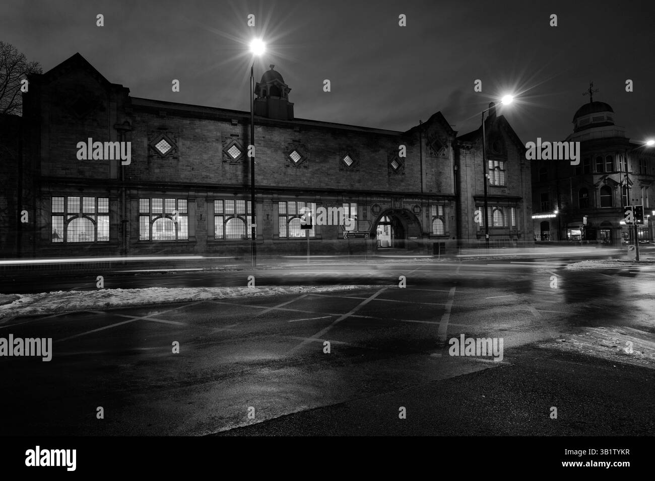 Dusk view of the public Library in Keighley town, Yorkshire, England ...