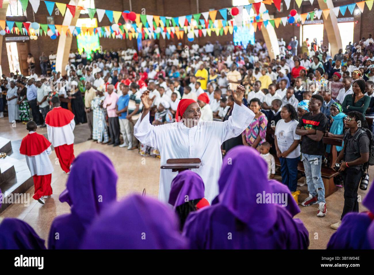 Parishioners attend a mass in honour of the late Pope Francis at the ...