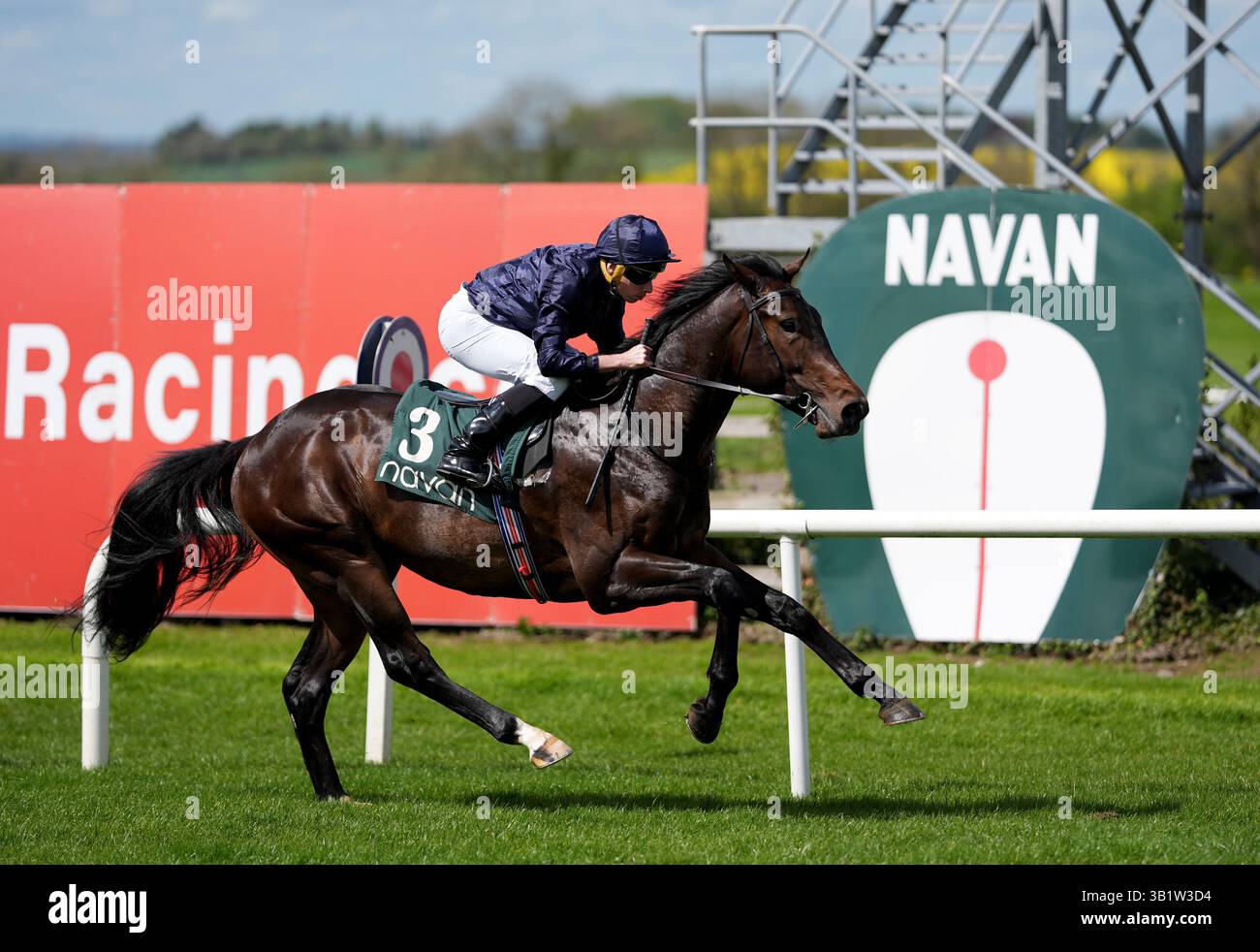 Charles Darwin ridden by jockey Ryan Moore on their way to winning the ...