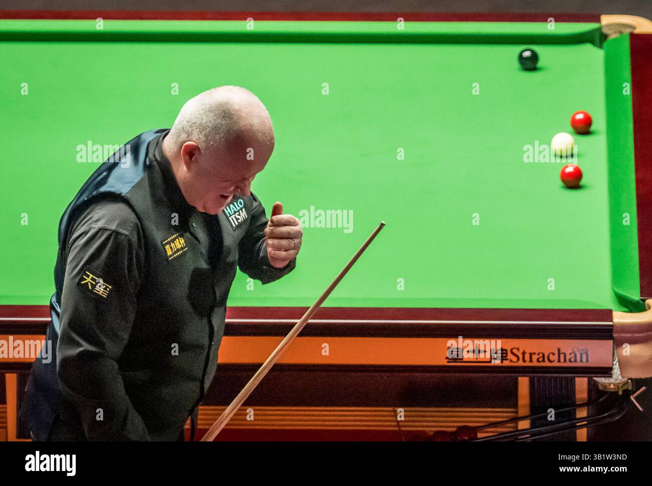 John Higgins after missing a shot during his match agains Xiao Guodong ...