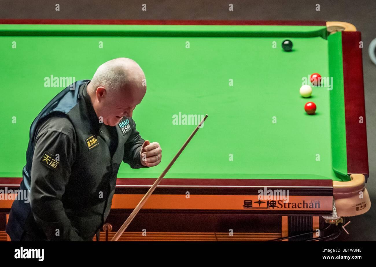 John Higgins after missing a shot during his match agains Xiao Guodong ...