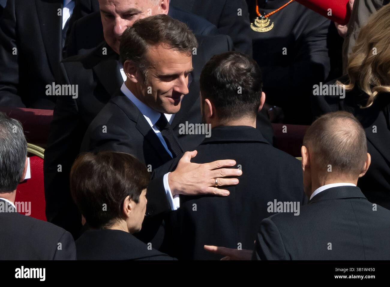 Rome, Italy. 26th Apr, 2025. French President Emmanuel Macron, left ...