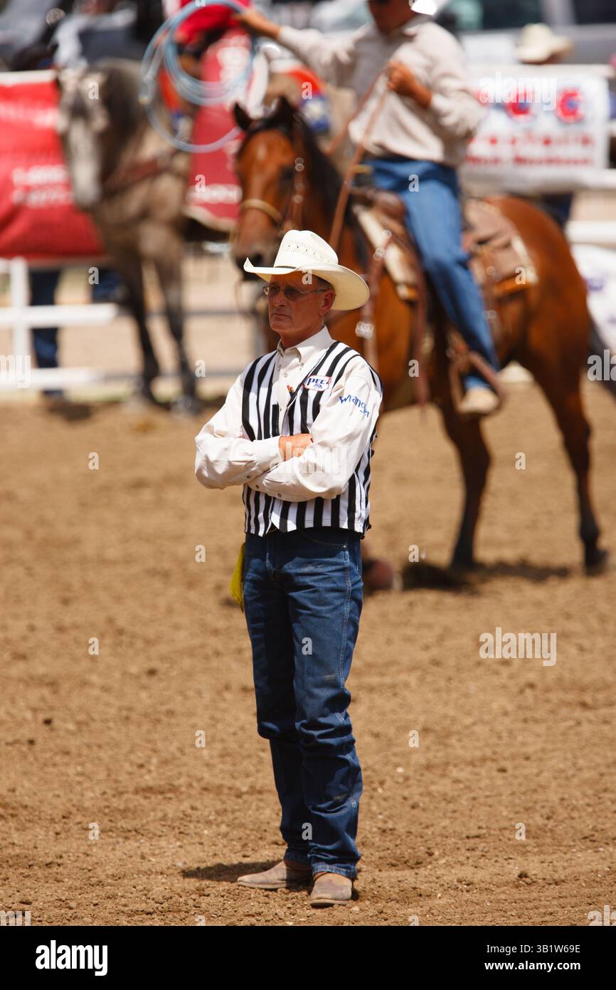 A rodeo judge observes the competition at the 90th annual Black Hills ...