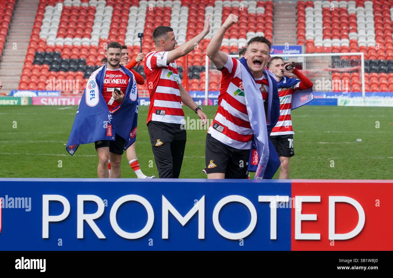 Doncaster Rovers celebrate promotion to League One during the Sky Bet ...