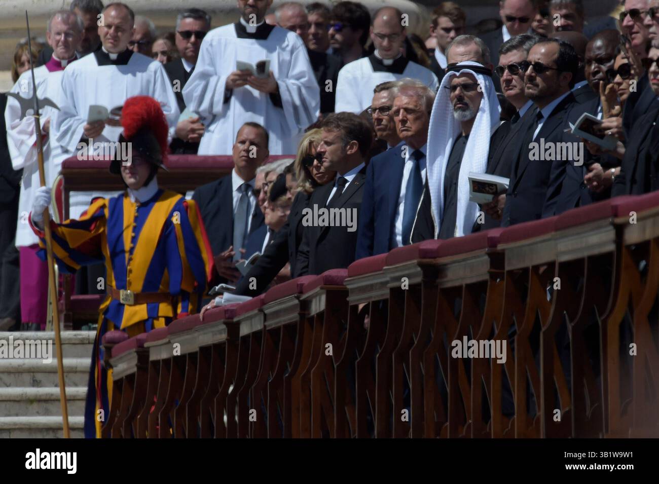 Cardinal Giovanni Battista Re blesses the coffin during the funeral of ...