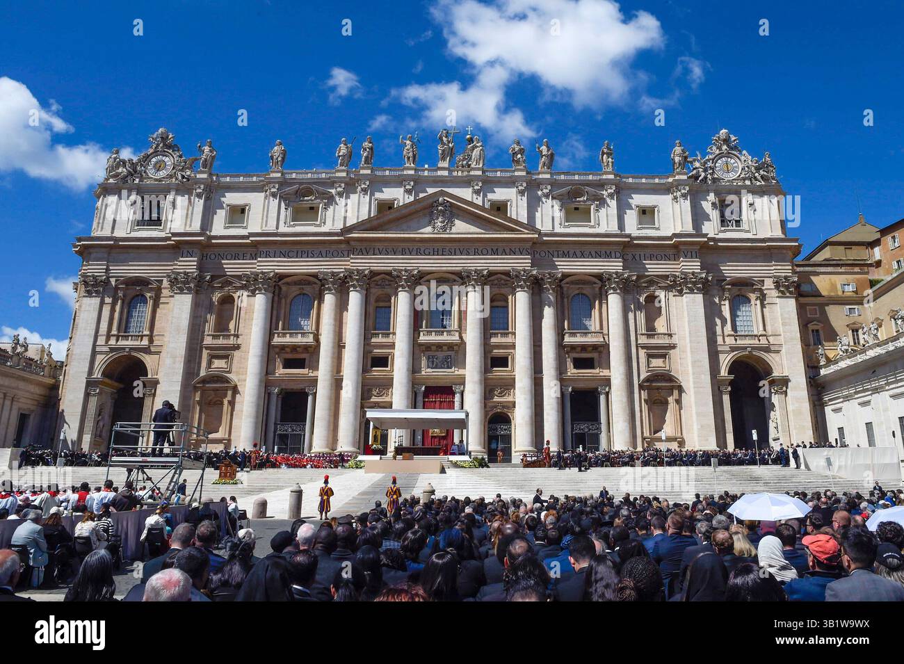 Cardinal Giovanni Battista Re blesses the coffin during the funeral of ...