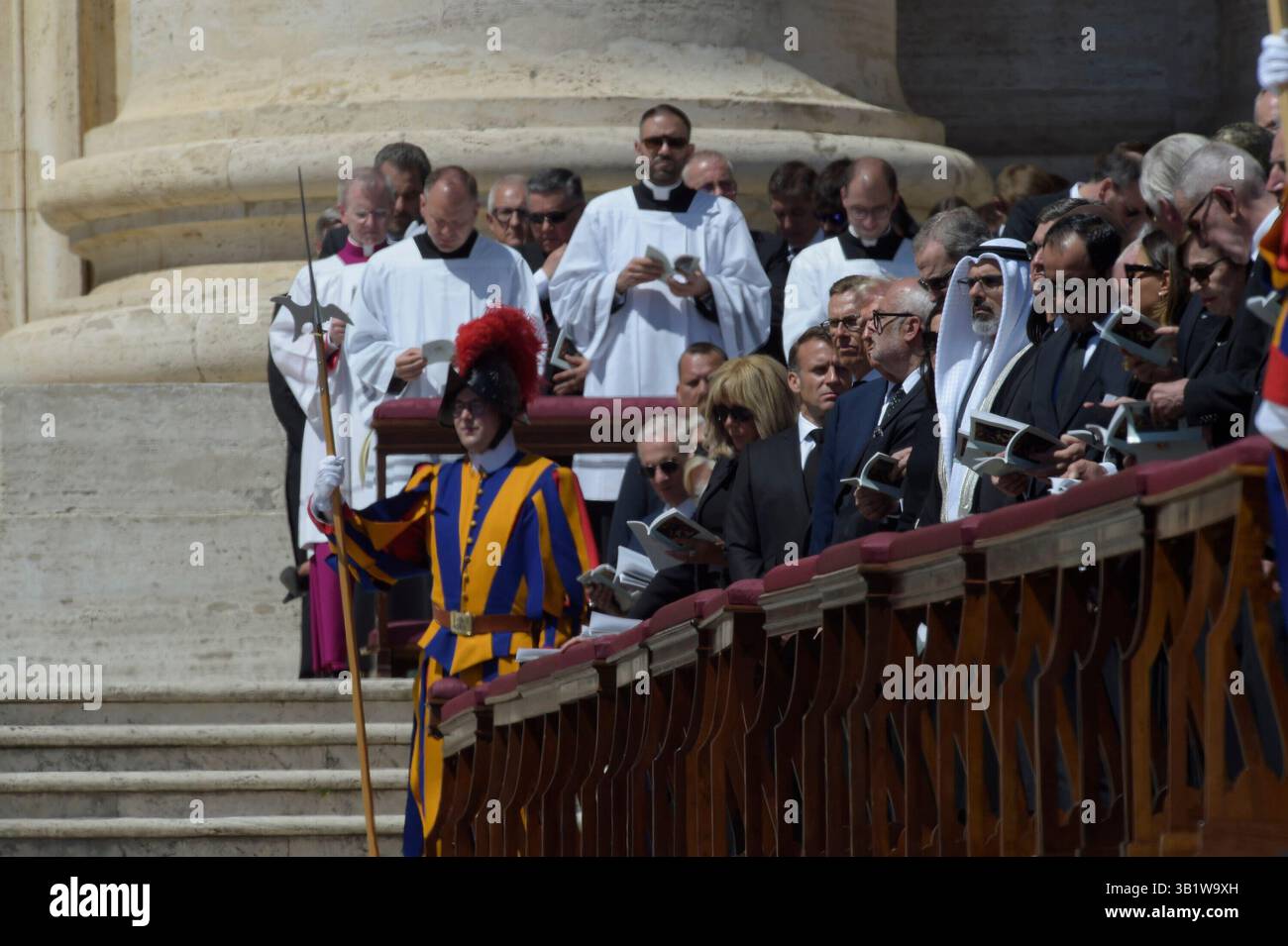 Cardinal Giovanni Battista Re blesses the coffin during the funeral of ...