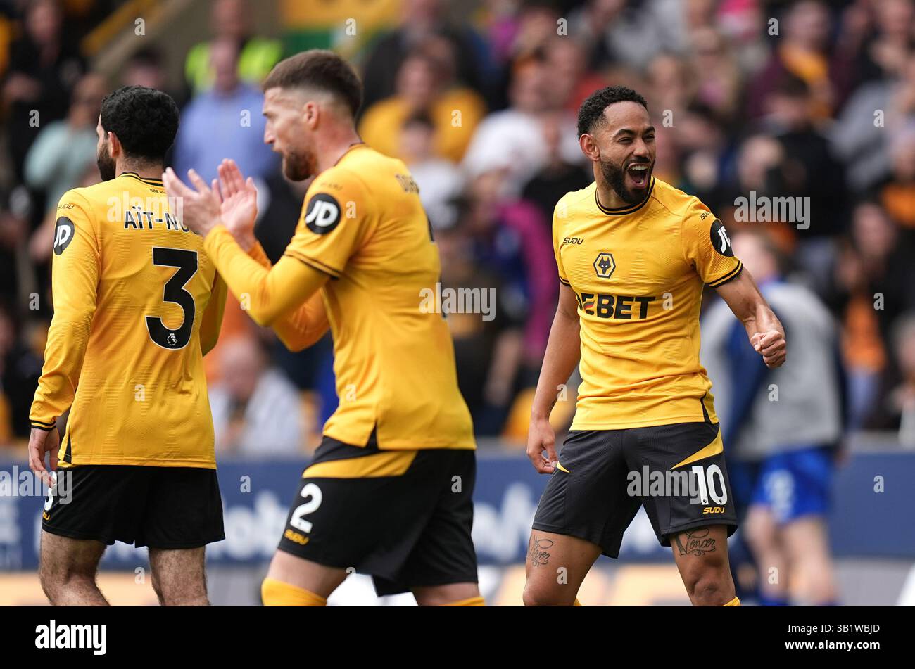 Wolverhampton Wanderers' Matheus Cunha (right) celebrates scoring their ...