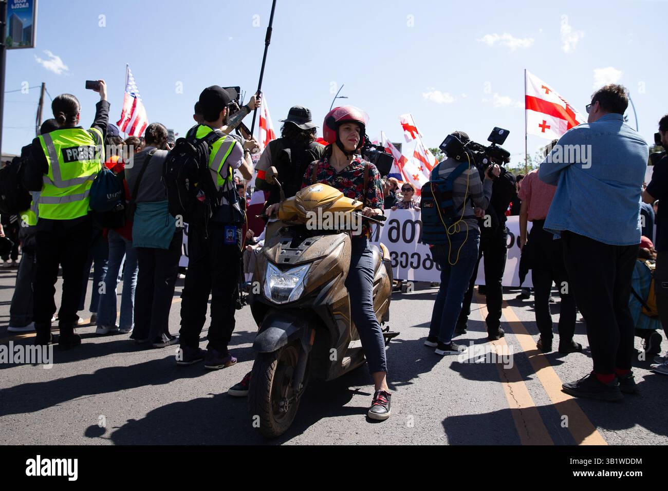 Tbilisi, Tbilisi, Georgia. 26th Apr, 2025. People on scooters are ...