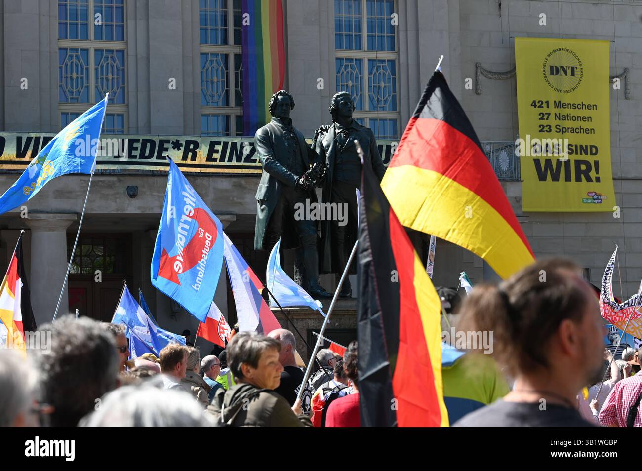 Weimar, Germany. 26th Apr, 2025. Flags in front of the Goethe-Schiller ...