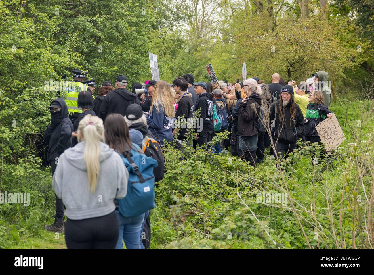 Huntingdon, UK. 26 APR, 2025. Activists shout towards police during a ...
