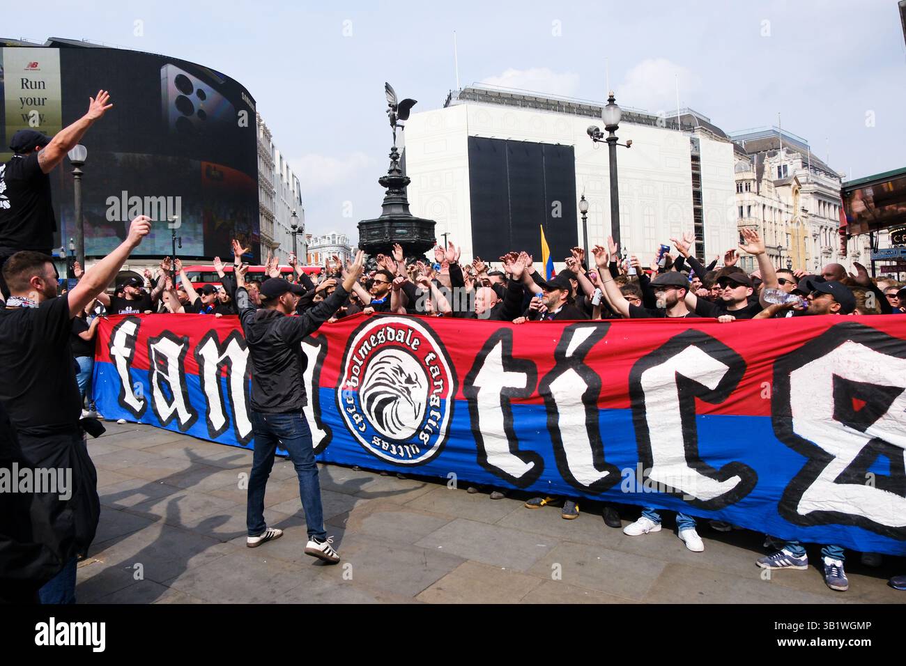 Piccadilly Circus, London, UK. 26th Apr 2025. Crystal Palace ultras ...