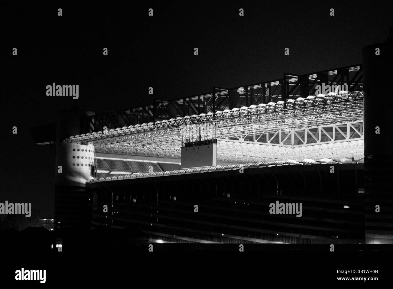 Night view of the San Siro stadium in Milan, illuminated by the light ...