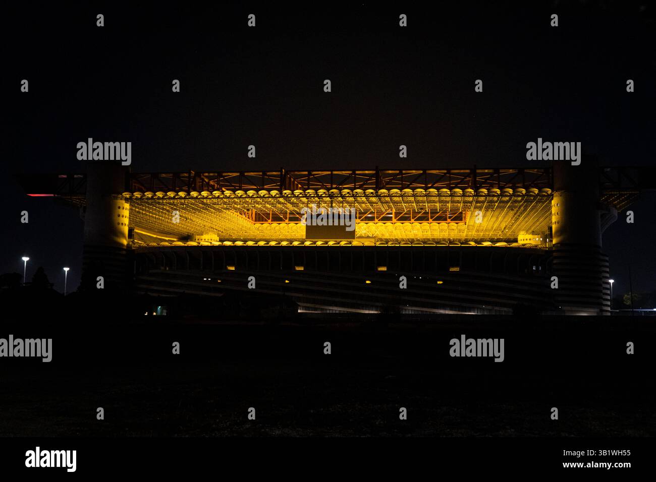 Night view of the San Siro stadium in Milan, illuminated by the light ...