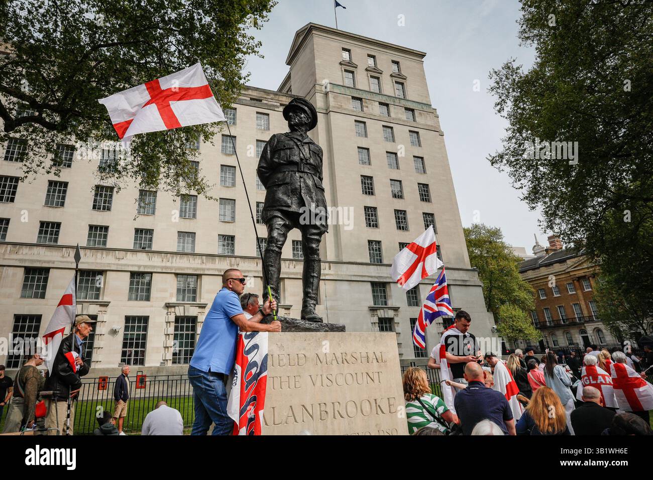 London, UK. 26th Apr, 2025. A crowd of spectators decked out with ...