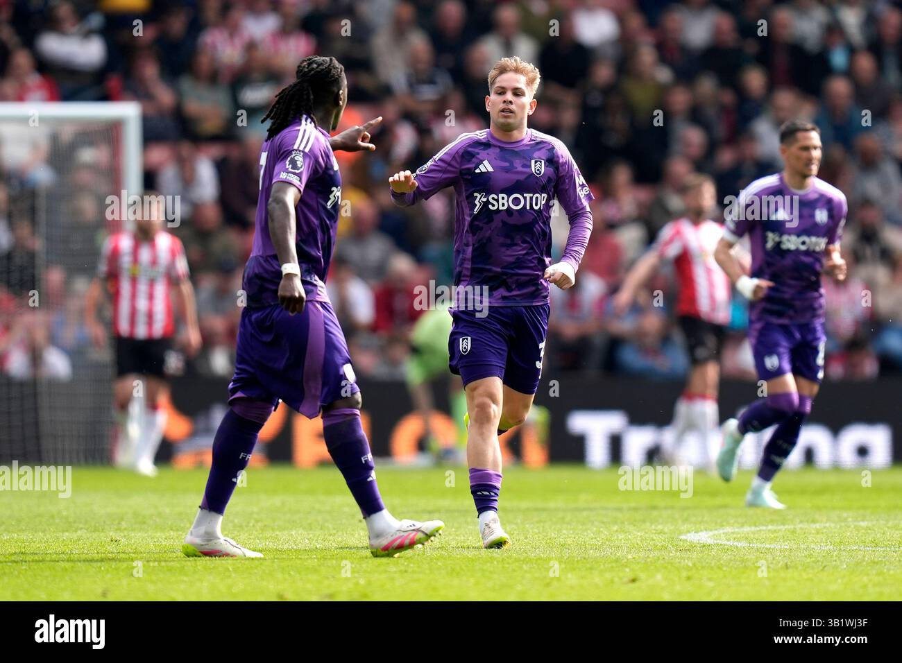 Fulham's Emile Smith Rowe (centre) celebrates scoring their side's ...