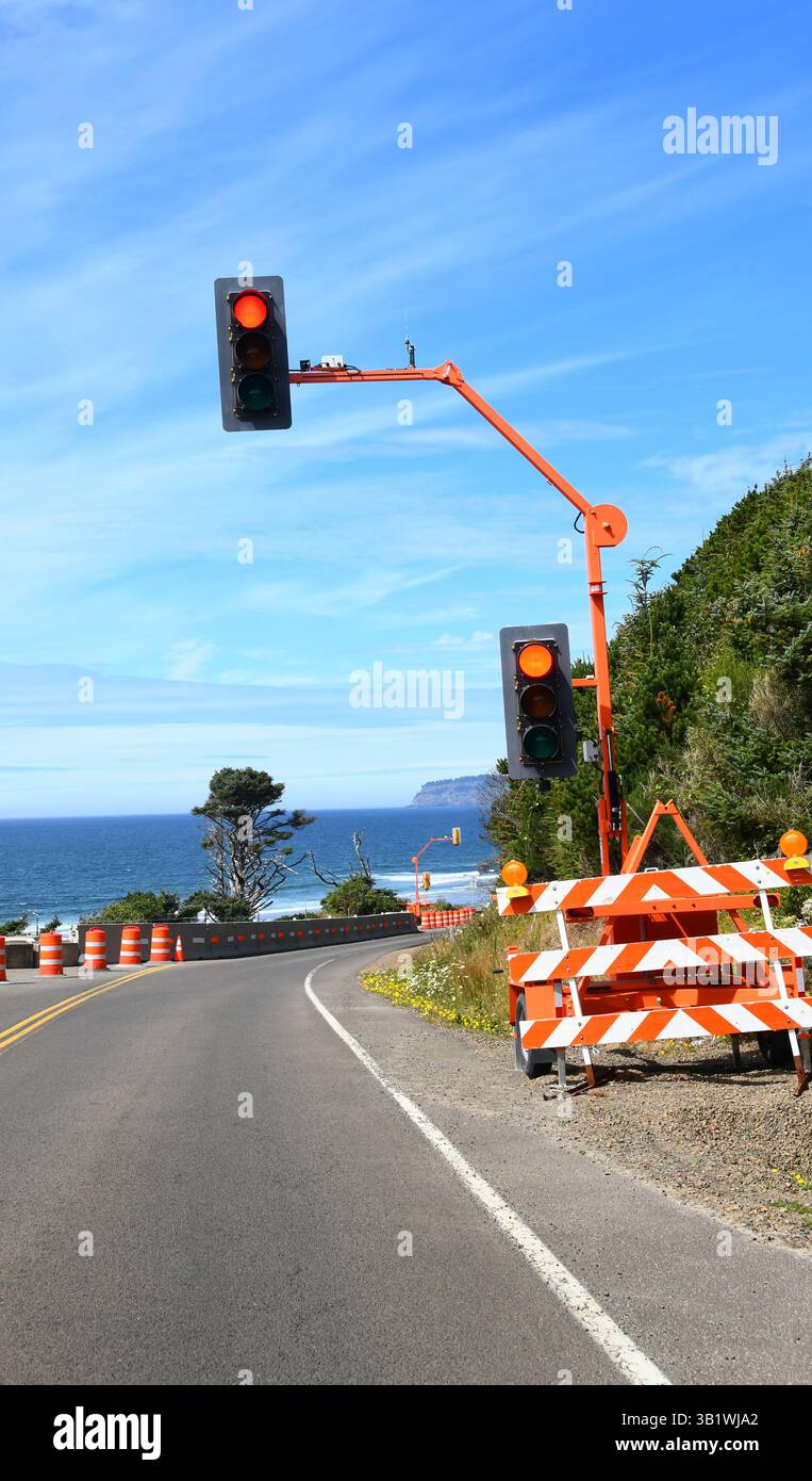 Temporary stop light, used in highway construction, stops traffic on ...