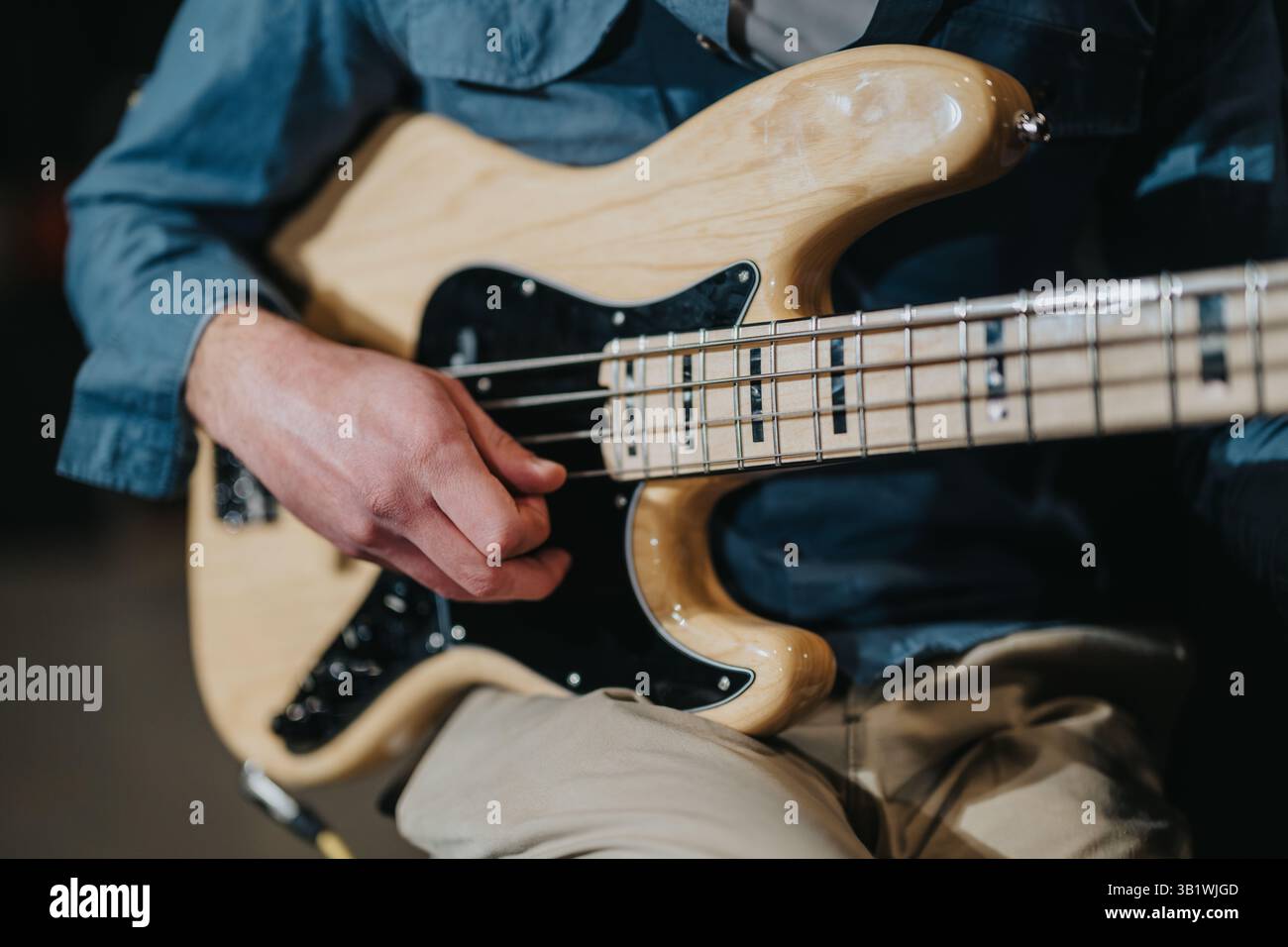Detailed view hands plucking strings hi-res stock photography and ...