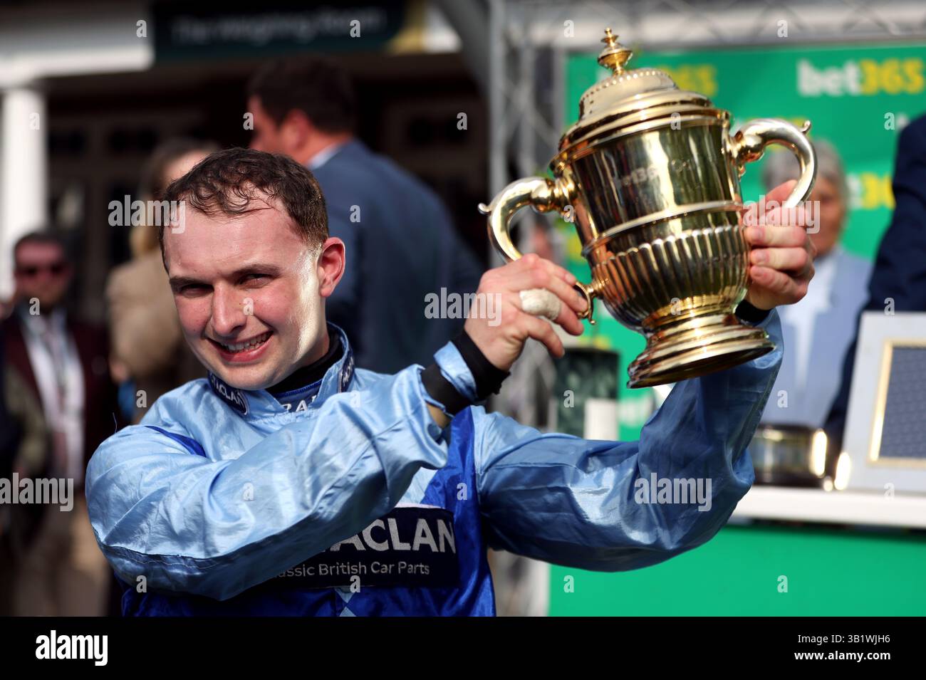 Jockey Sean Bowen with the trophy after winning the bet365 Gold Cup ...