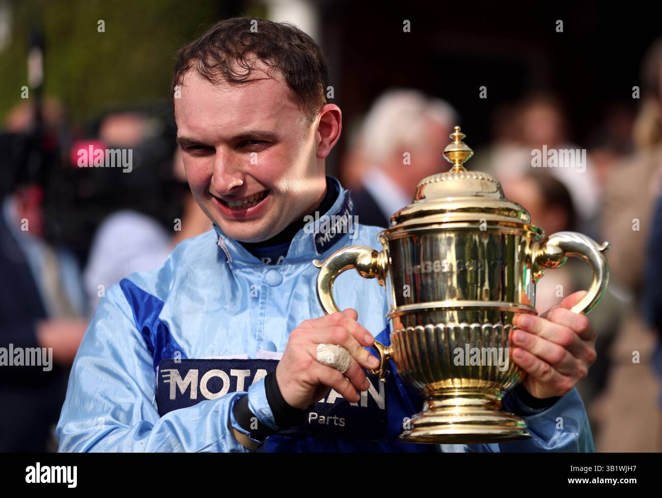 Jockey Sean Bowen with the trophy after winning the bet365 Gold Cup ...
