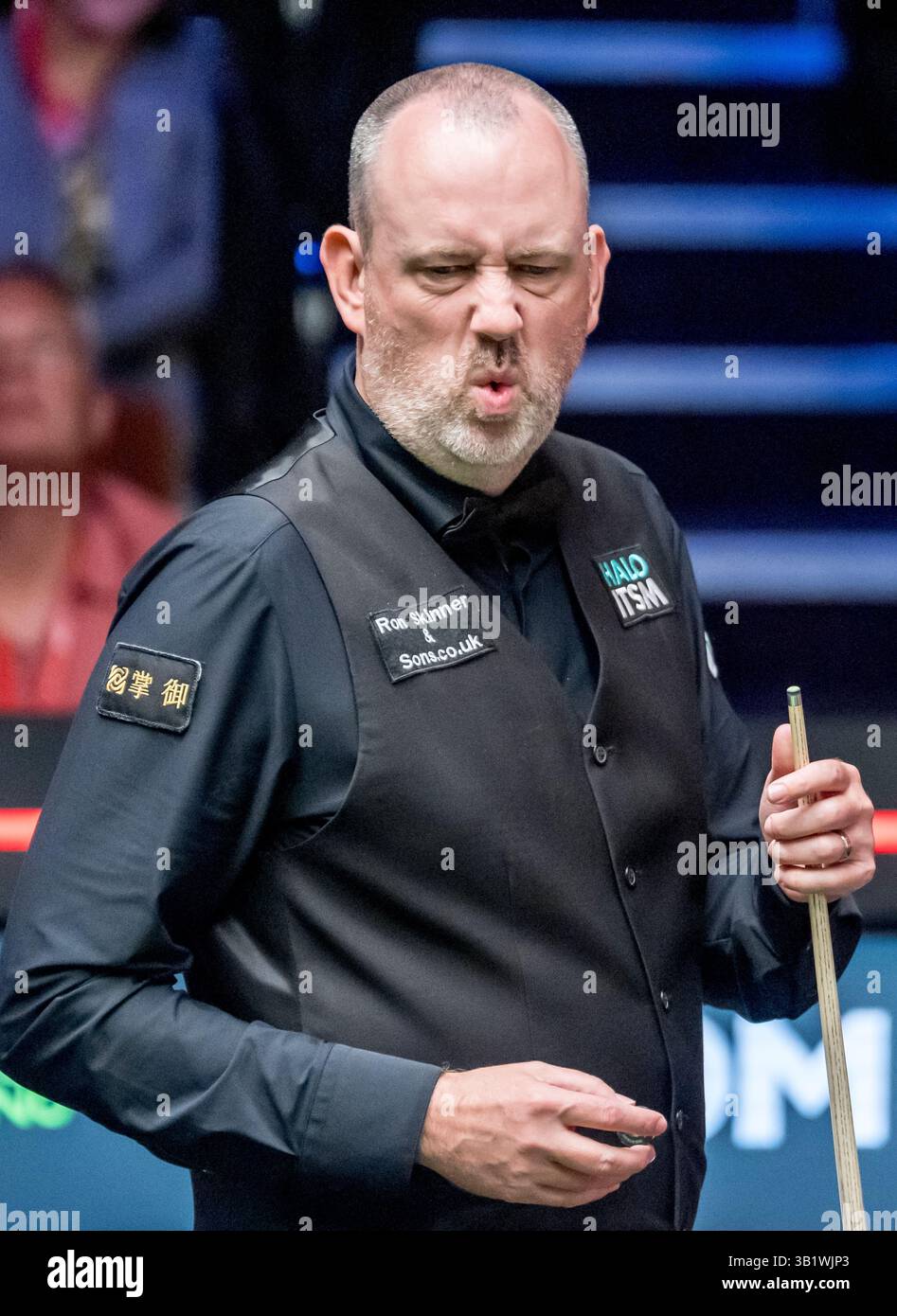 Mark Williams during his match against Hossein Vafae, on day eight of the Halo World Snooker ...