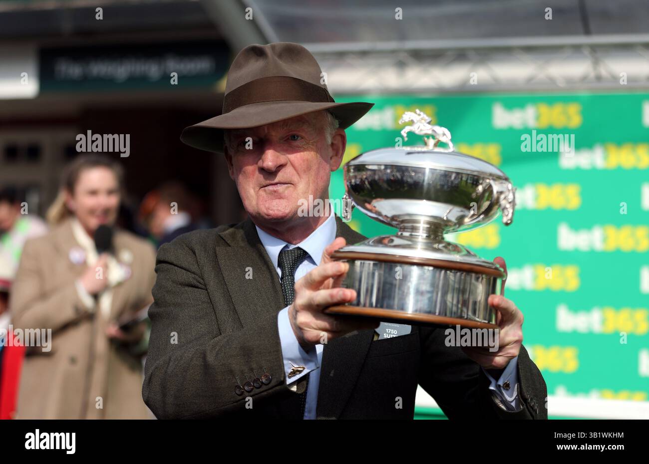 Trainer Willie Mullins with the Champion Jump trainer trophy at Sandown ...
