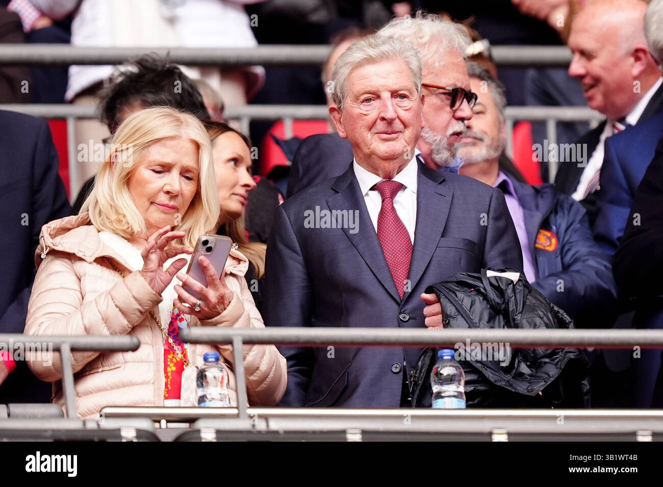 Former Crystal Palace and England manager Roy Hodgson (right) with his ...