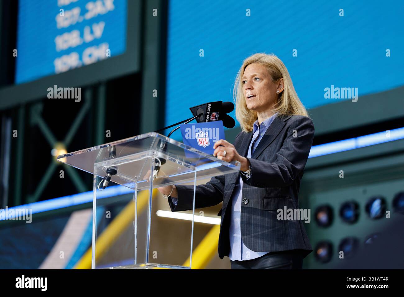 NFL Chief Football Administrative Officer Dawn Aponte is seen on stage ...