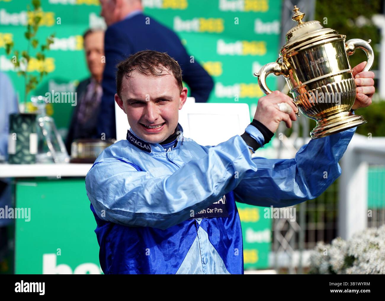 Jockey Sean Bowen with the trophy after winning the bet365 Gold Cup ...