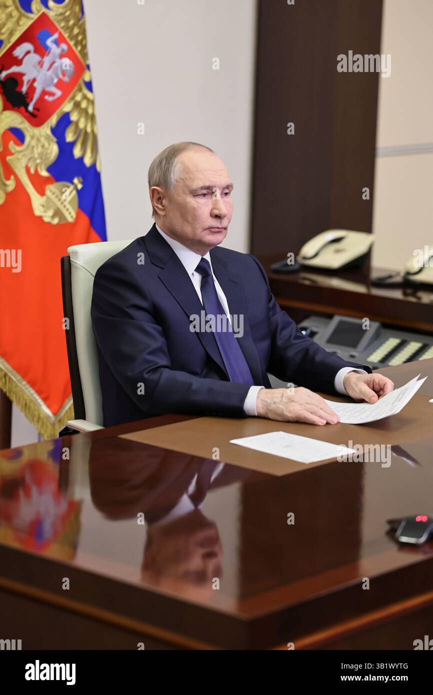 Russian President Vladimir Putin listens to Russian Chief of General ...