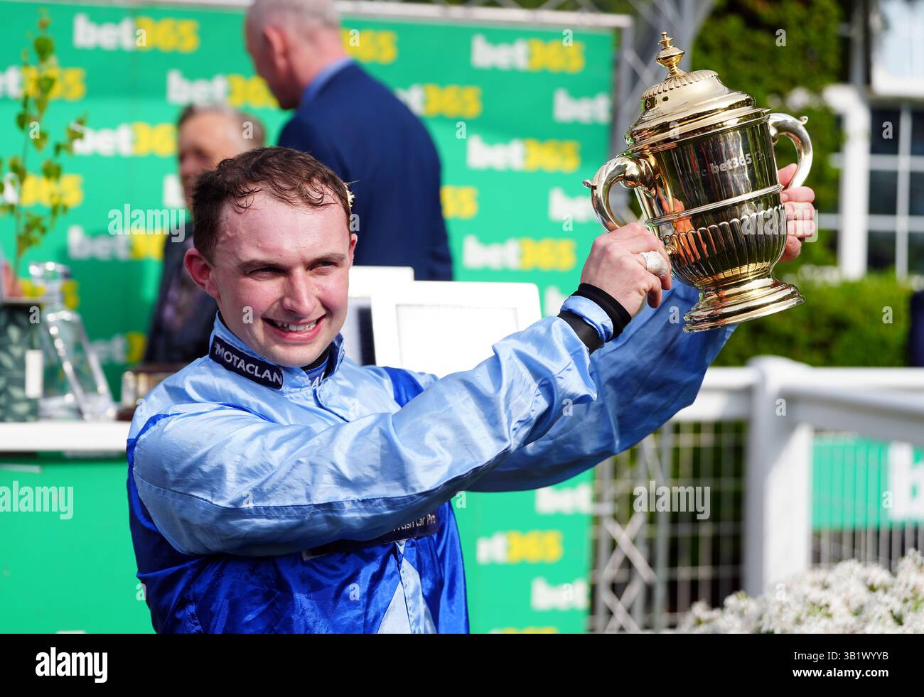 Jockey Sean Bowen with the trophy after winning the bet365 Gold Cup ...