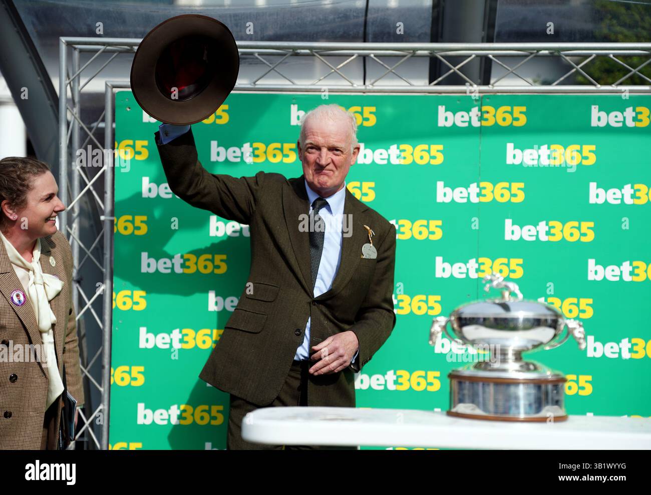 Trainer Willie Mullins with the Champion Jump trainer trophy at Sandown ...