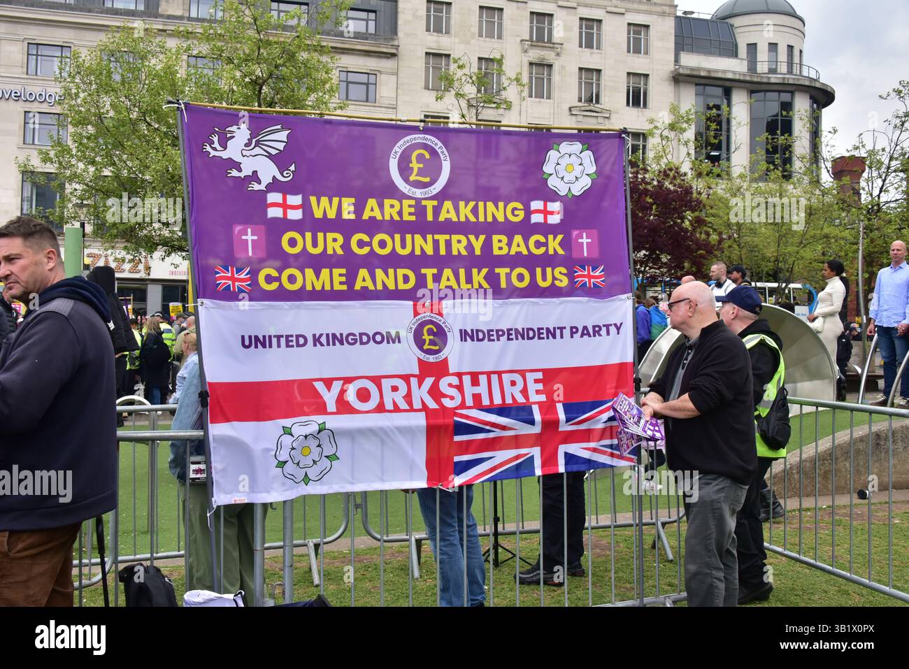Manchester, UK, 26th April, 2025. UK Independent Party banner. A ...