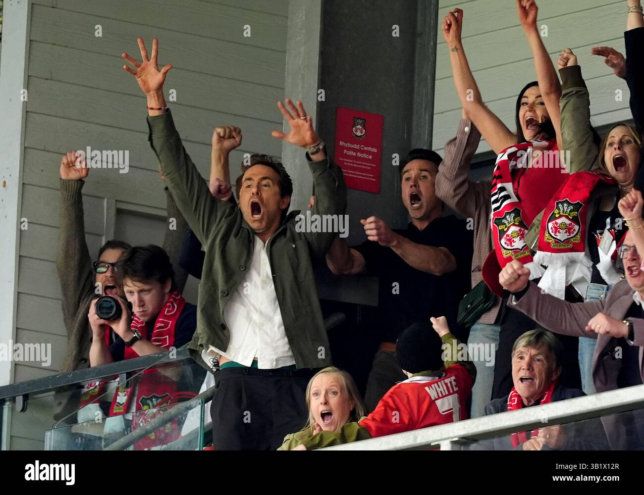Wrexham co-owners Ryan Reynolds (left) and Rob McElhenney celebrate ...