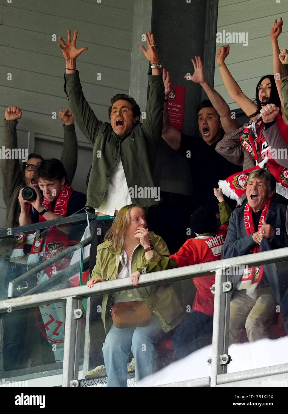 Wrexham co-owners Ryan Reynolds (left) and Rob McElhenney celebrate ...
