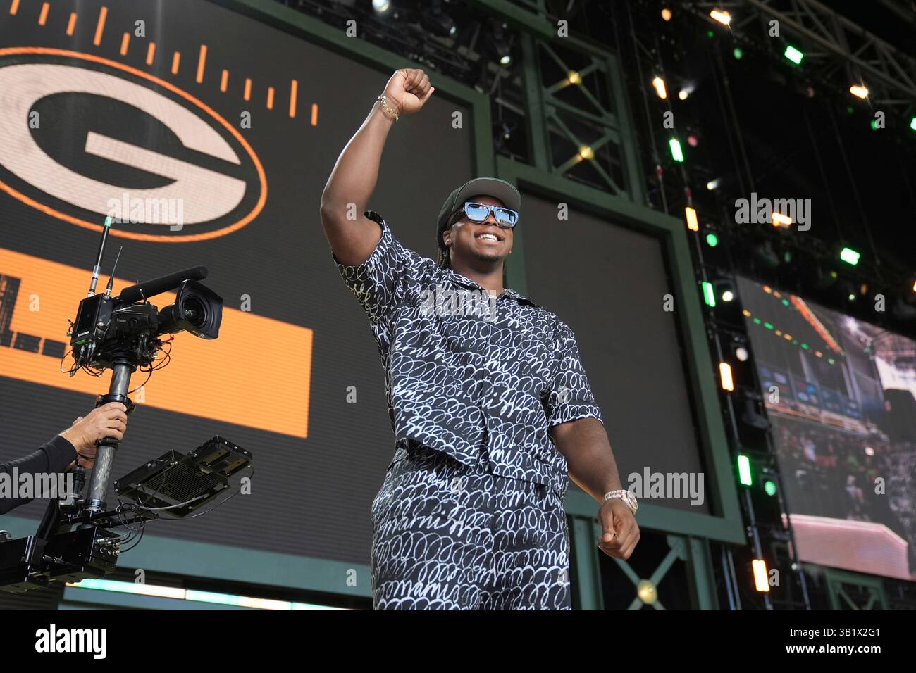 Texas defensive lineman Barryn Sorrell celebrates after being chosen by ...