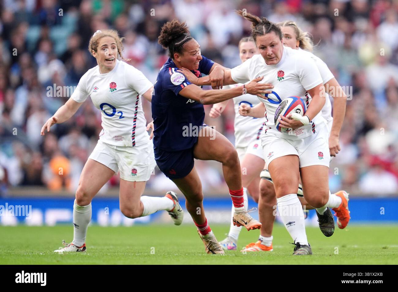 England's Amy Cokayne (right) attempts to break clear during the ...