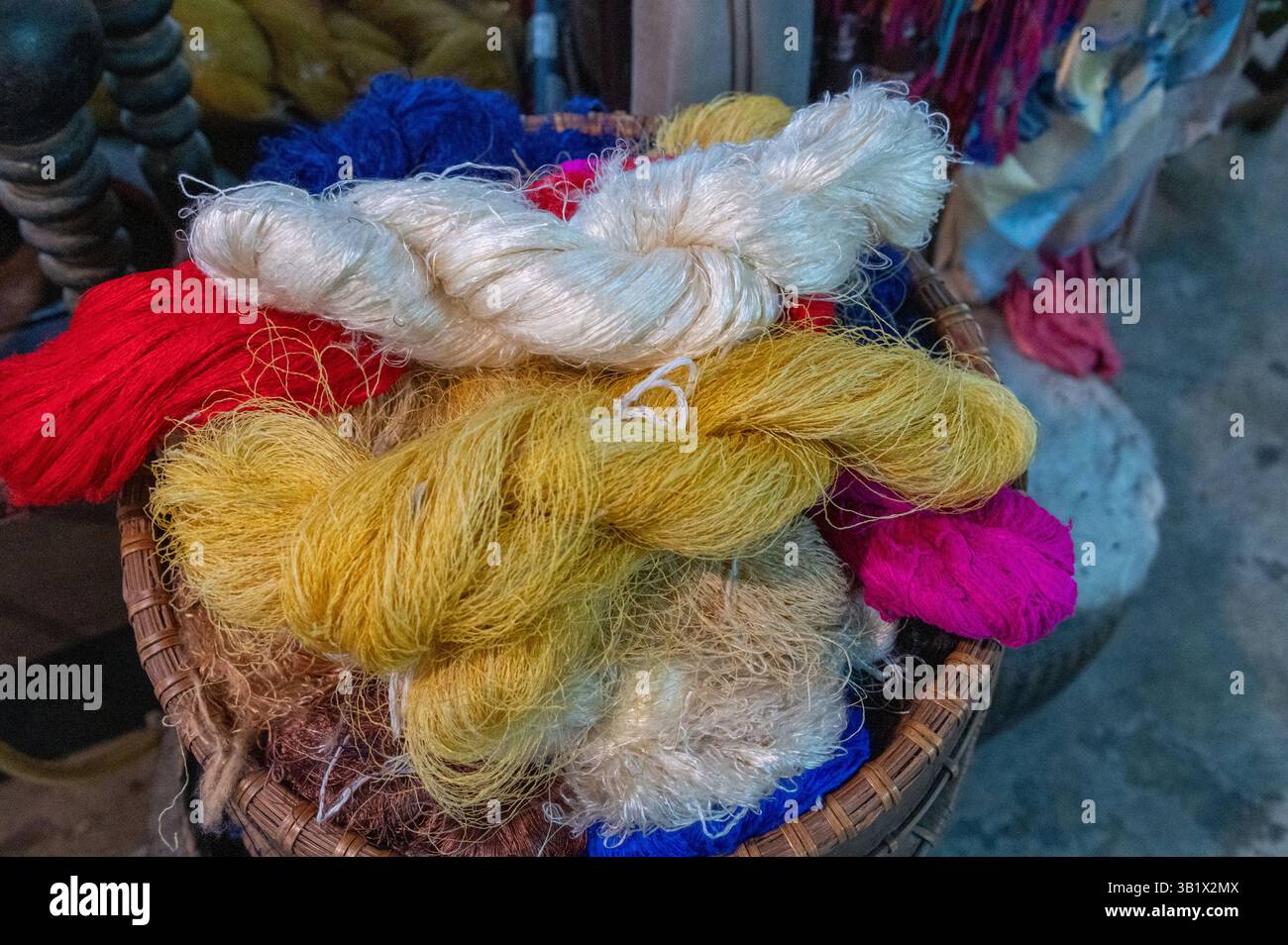 The silk dyed coloured fibers in a basket at the ‘Thai Silk Village ...