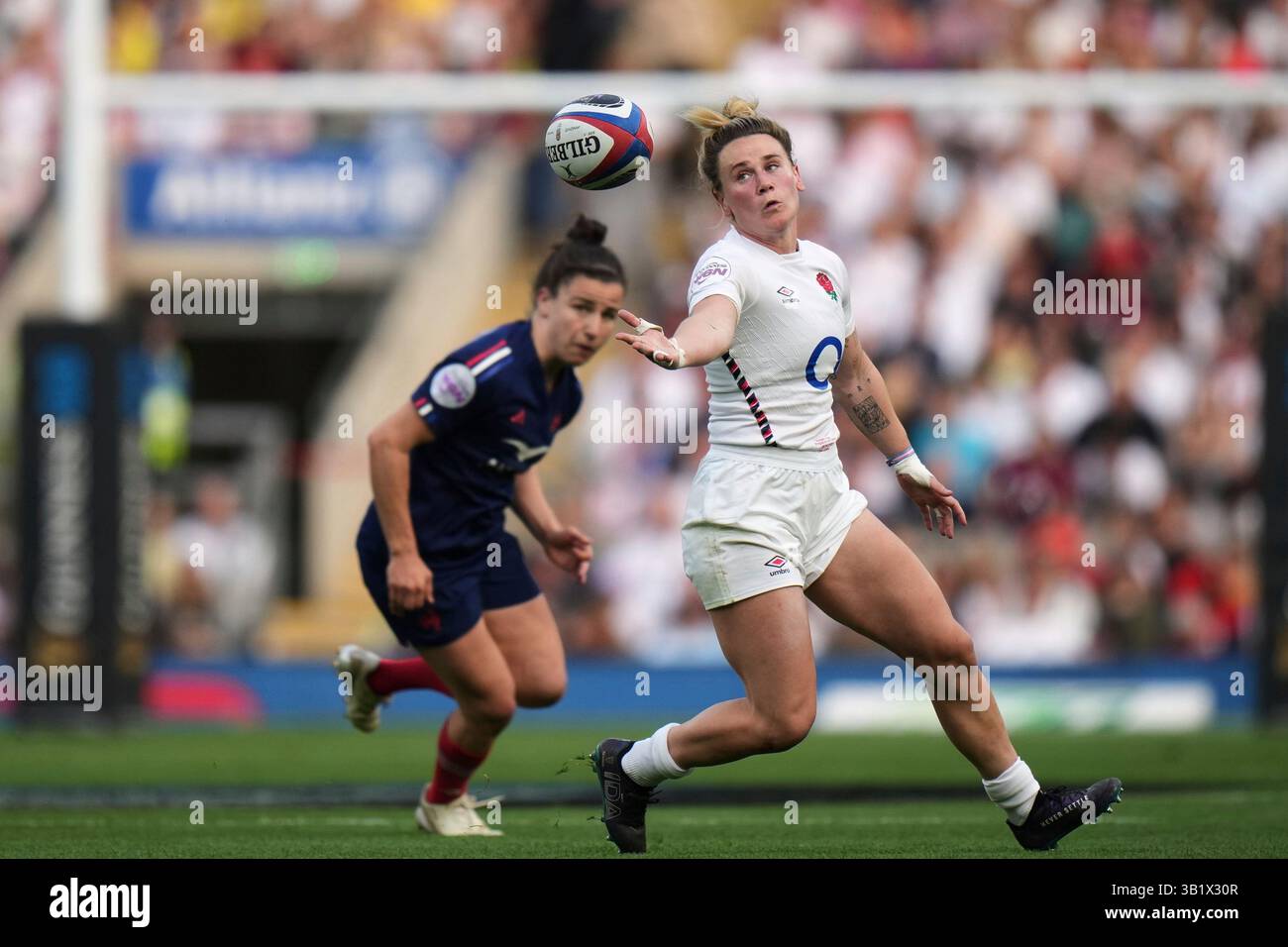 England's Megan Jones, right, juggles the ball during the Women's Six ...