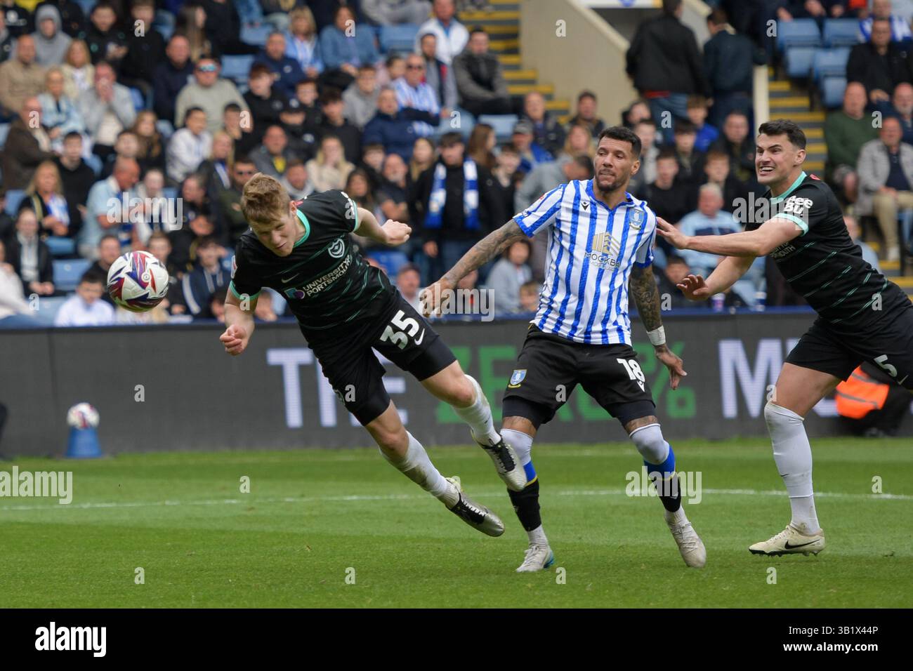 Portsmouth's Rob Atkinson just fails to connect to a header during the ...