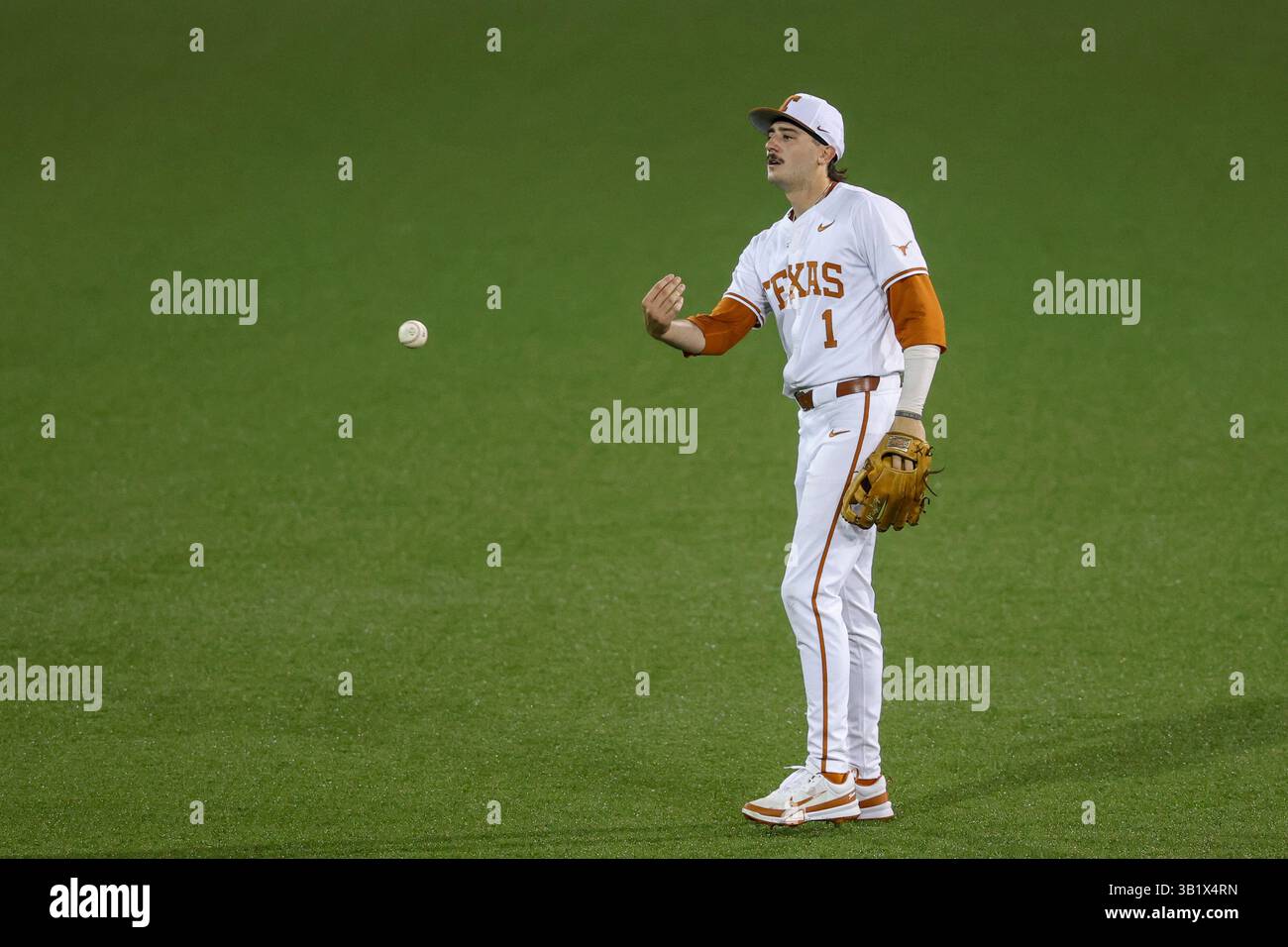 AUSTIN, TX - APRIL 25: Texas infielder Jalin Flores (1) tosses the ball ...